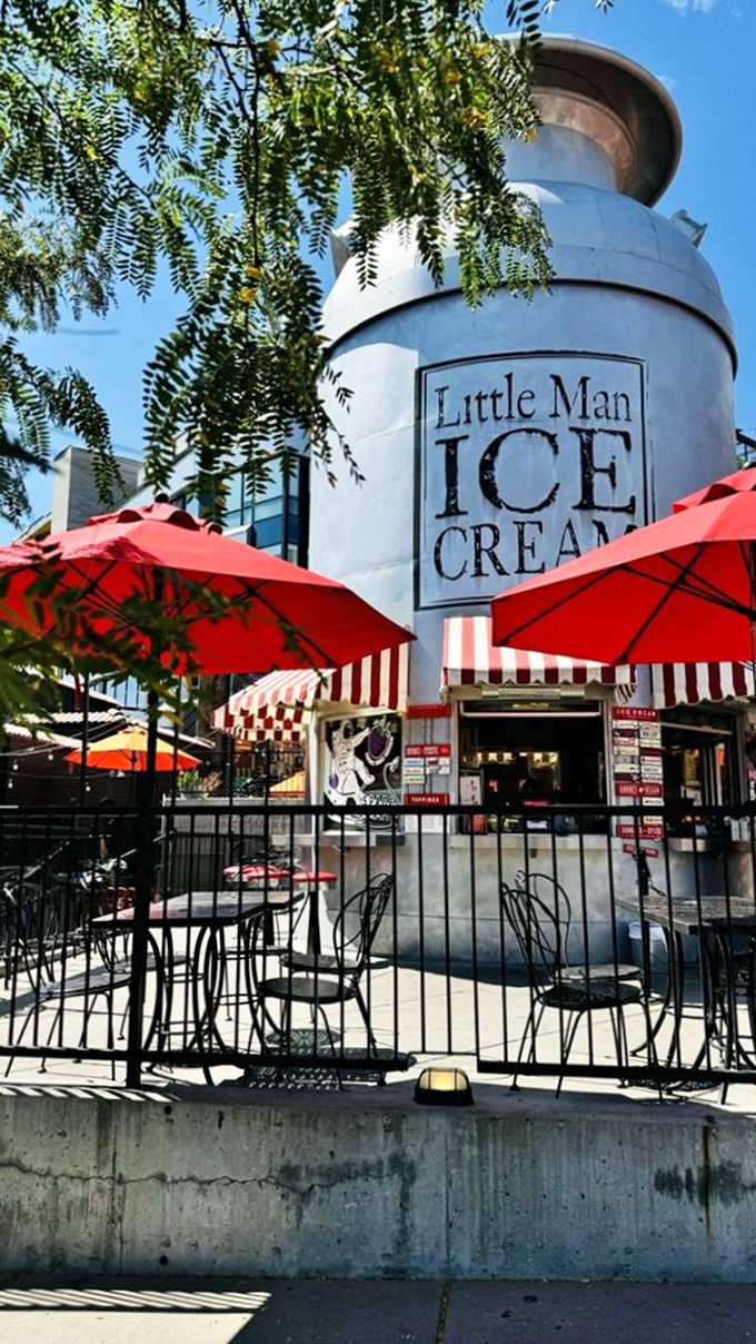 Red umbrellas and wrought iron tables create the perfect stage for ice cream enjoyment. Little Man's outdoor seating area is prime real estate on summer evenings.