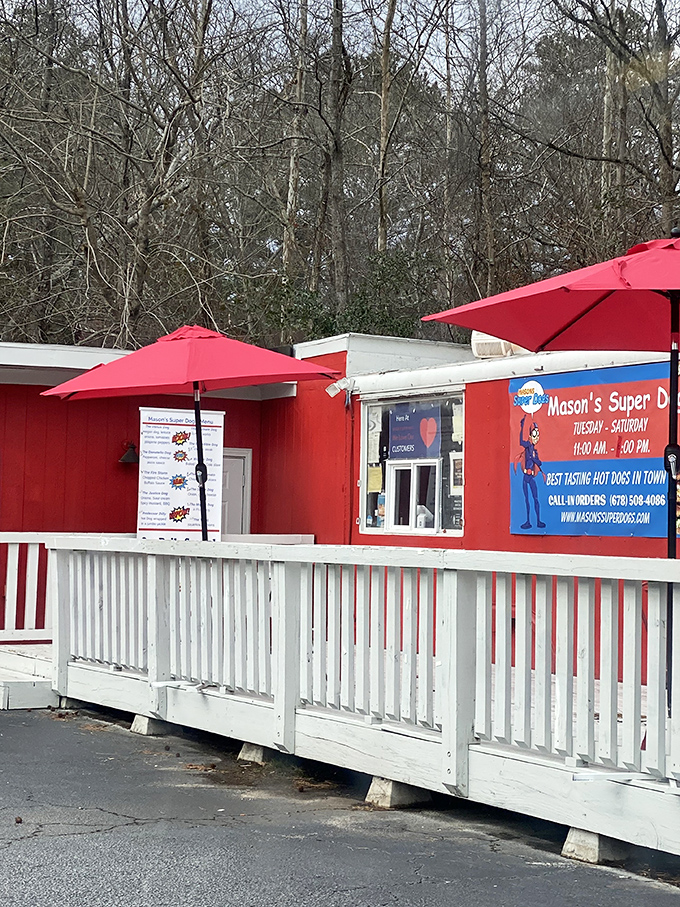 Red umbrellas provide shade while you contemplate life's big question: how soon is too soon to come back for another super dog?