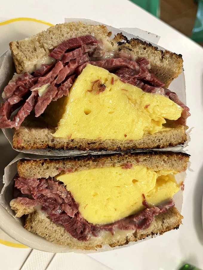 Pastrami and egg unite in a breakfast sandwich that makes you question why this combination isn't mandatory morning eating everywhere. 