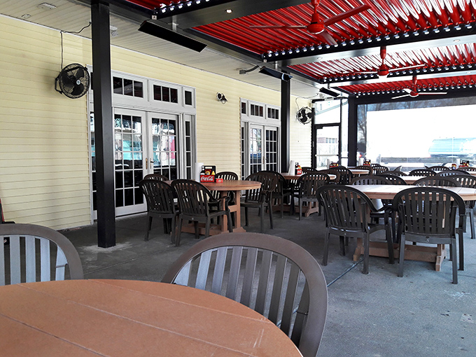 The outdoor patio: where summer breezes, cold drinks, and post-burger food comas come together in perfect Midwestern harmony.