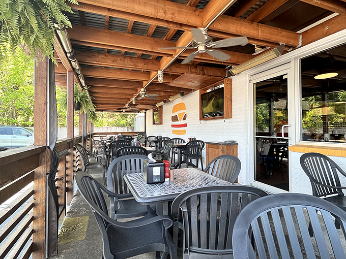 The covered patio offers al fresco dining for those who prefer their hot dog experience with a side of fresh air.