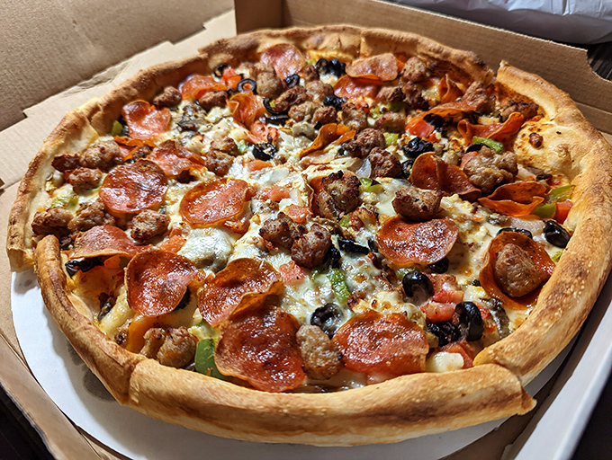 Pizza architecture at its finest&mdash;where the structural integrity of that perfect crust supports a small city of toppings.