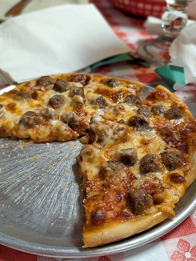 This isn't just pizza—it's a round declaration of independence from mediocre chain pies that forgot the meaning of "handcrafted."