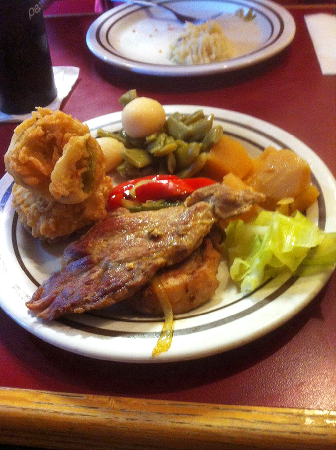 This isn't just a plate &ndash; it's a Southern symphony of fried delights, tender meat, and vegetables that actually taste like vegetables.