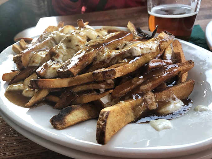 Gravy-soaked fries with melted cheese&mdash;proof that sometimes the messiest foods are life's greatest pleasures. Napkins required, regrets forbidden.