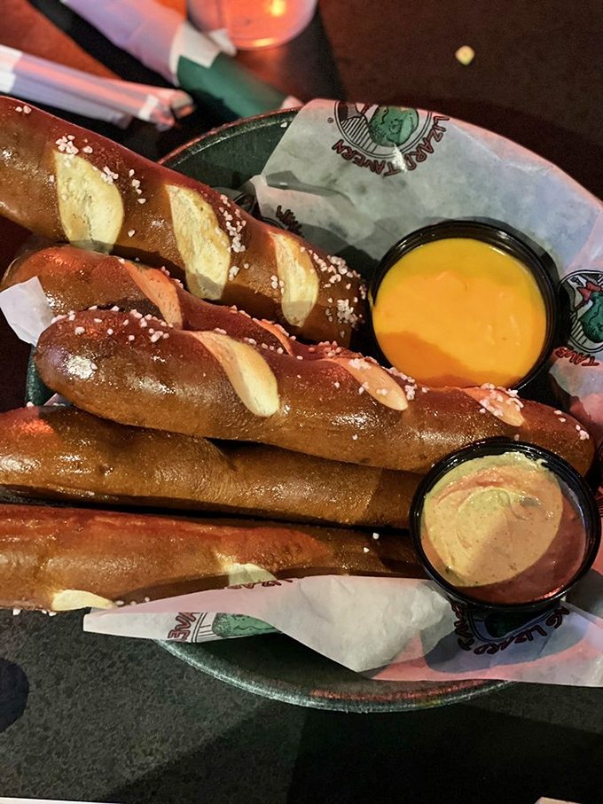 Pretzel sticks that make you question why you've wasted time on lesser versions. The dipping sauces are having their own little party.