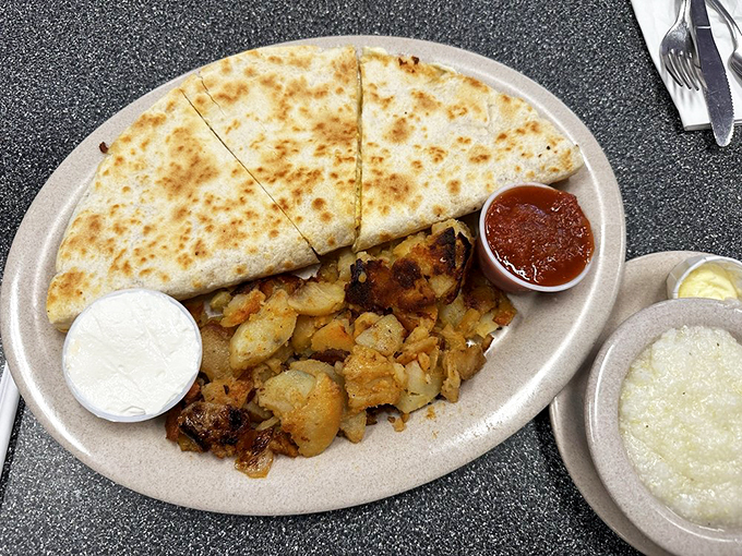 Quesadillas with a side of perfectly crisped home fries&mdash;proof that American diners have mastered the art of culinary diplomacy.