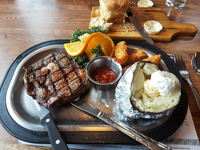 This isn't just steak&mdash;it's a carnivore's dream vacation on a plate, complete with a baked potato sidekick. 