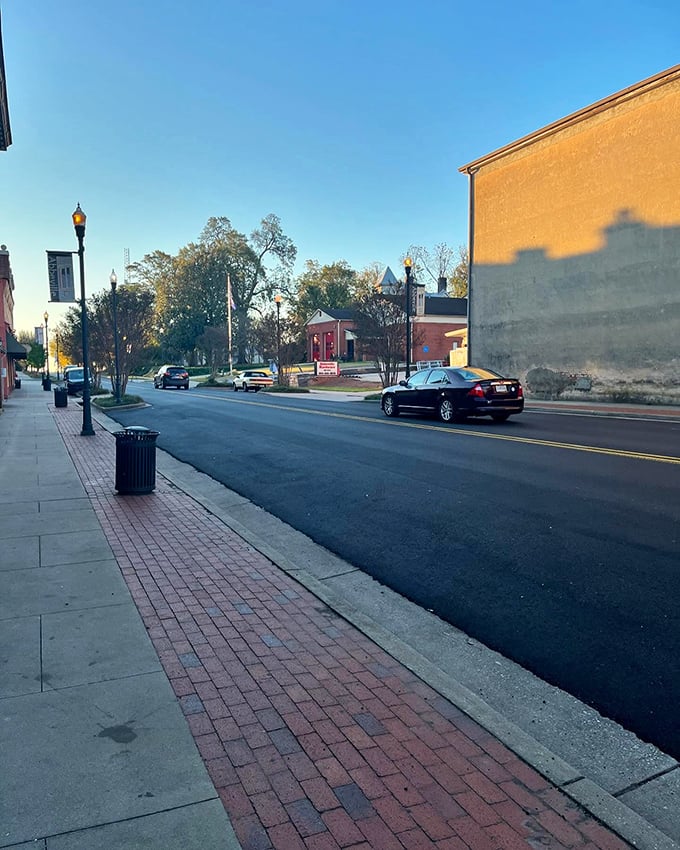 Abbeville's sidewalks and lampposts create that perfect small-town rhythm, where every stroll feels like you're in the opening scene of a feel-good movie.