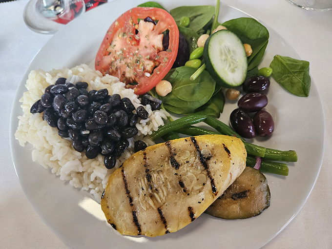 A plate that proves vegetables can hold their own at a steakhouse. This colorful ensemble offers a refreshing intermission between meat courses.