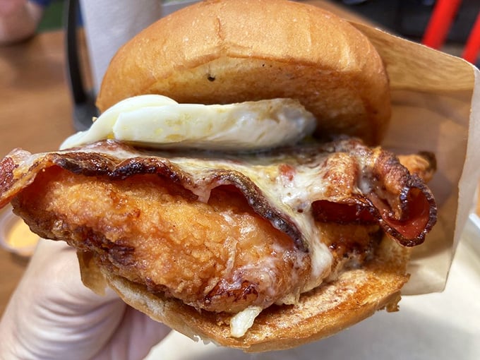 The Se&ntilde;or Croque sandwich&mdash;where breakfast meets lunch in a harmonious union of fried chicken, bacon, and sunny-side-up egg that would make any brunch jealous.