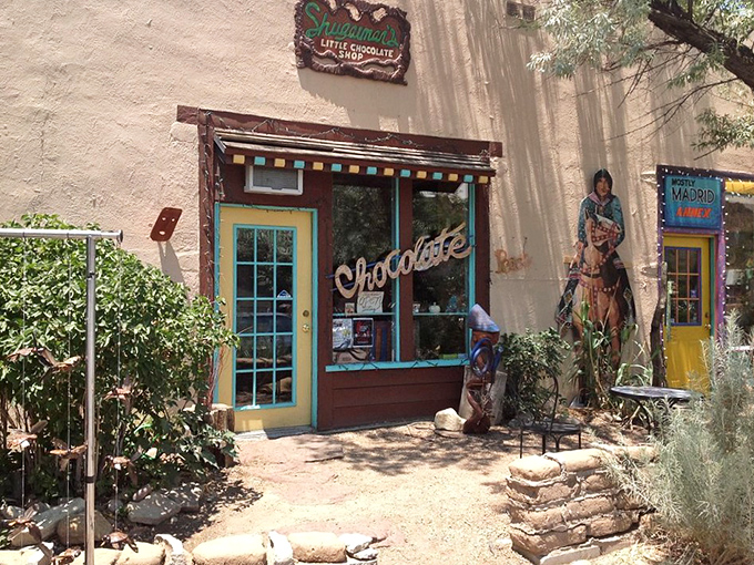 Shugarman's Little Chocolate Shop tempts passersby with its colorful facade and promises of handcrafted sweets&mdash;resistance is futile.