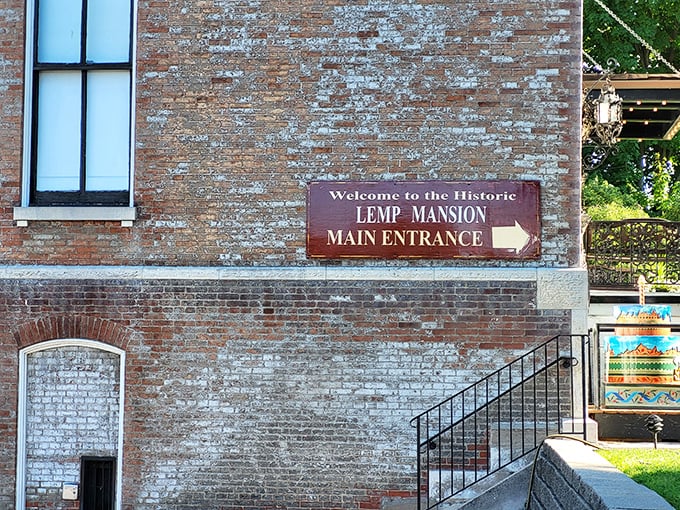 The unassuming entrance sign belies the extraordinary experiences within. Like finding a portal to the supernatural hiding in plain sight on a brick wall.