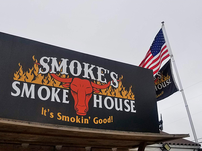 The logo says it all—a bull surrounded by flames. Not subtle, but neither is the flavor explosion waiting inside this humble establishment.