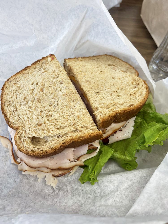 A turkey sandwich on wheat that makes all your sad desk lunches hang their heads in shame.