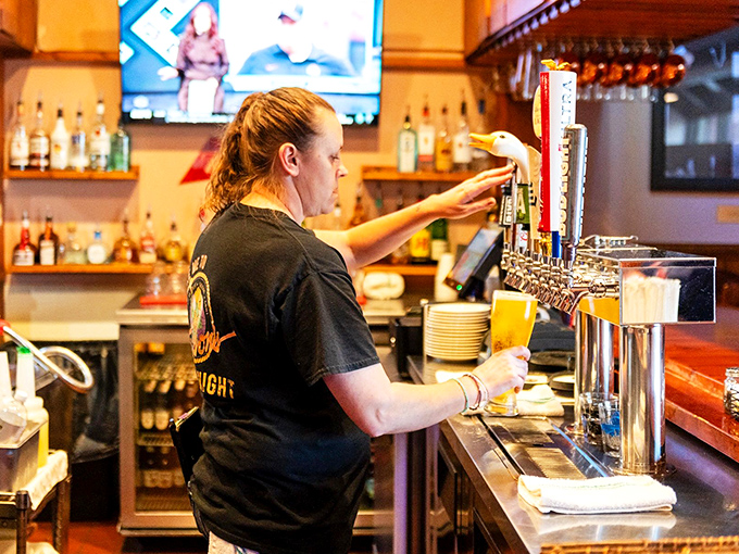 Behind every great steak is a dedicated team. The staff moves with practiced efficiency, keeping the beer cold and the grills hot.