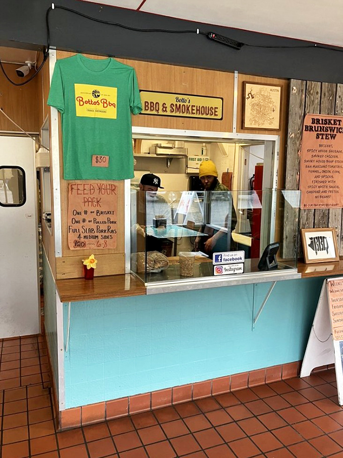 The counter service setup gets you from hungry to happy with minimal fuss. That turquoise blue counter adds a pop of color to the meat-centric experience. 