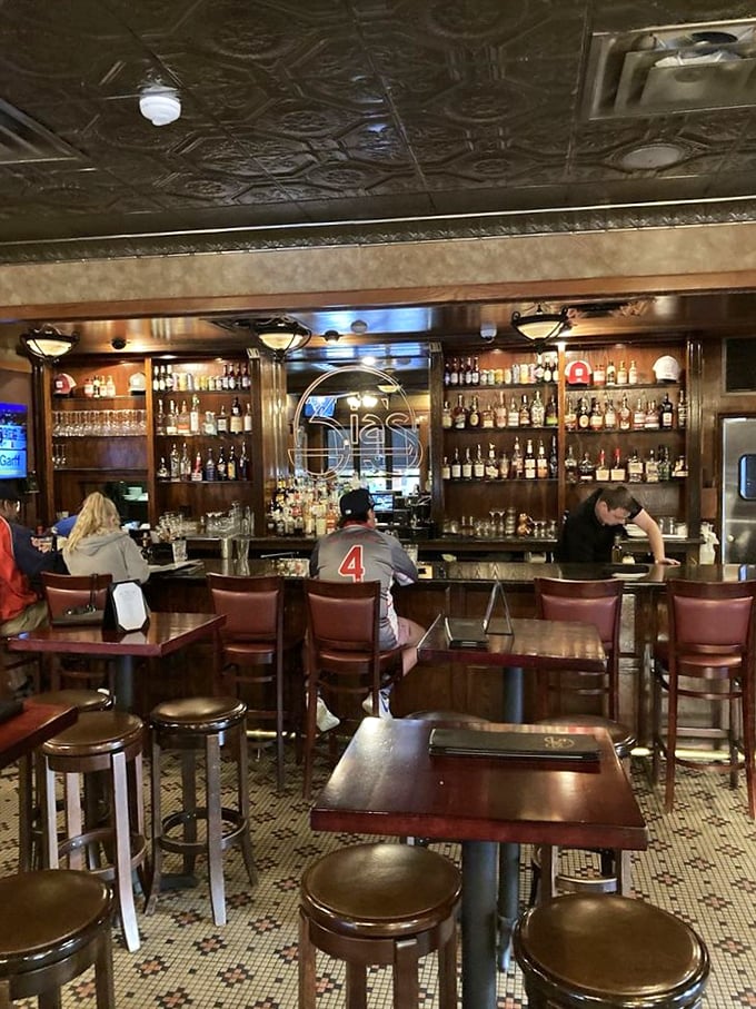 The bar at Zia's: where Italian spirits meet Midwest hospitality. That impressive bottle collection isn't just for show &ndash; though it does make for a handsome backdrop.