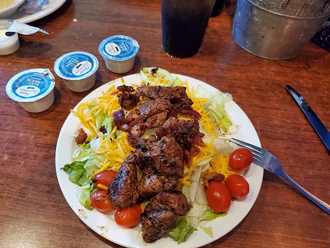 Steak tips crown this salad like jewelry, transforming what could be rabbit food into a protein-packed feast worthy of celebration.