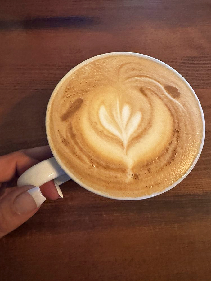 Latte art that's almost too pretty to drink&mdash;almost. The leaf design is nature's way of saying this coffee has roots in quality.