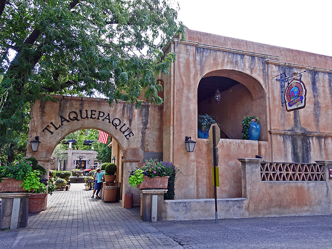 Tlaquepaque's arched entrance invites you into a world where shopping, art, and dining blend in Spanish Colonial splendor.