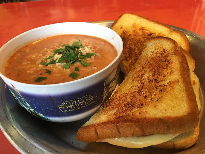 The perfect comfort food pairing exists! This golden-brown grilled cheese dunks beautifully into a Star Wars bowl of tomato bisque worthy of the Resistance.