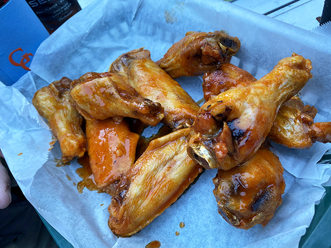 Wings that make you lick your fingers with zero shame. Glistening with sauce and perfectly crisp, they're the unsung heroes of the menu.
