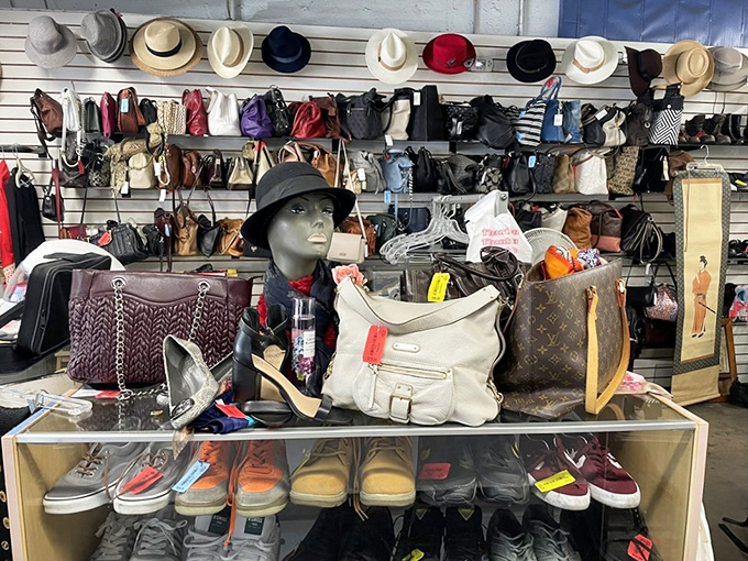 Designer bags mingle with practical totes in the accessories section, where mannequin heads model hats with the silent dignity of museum pieces.