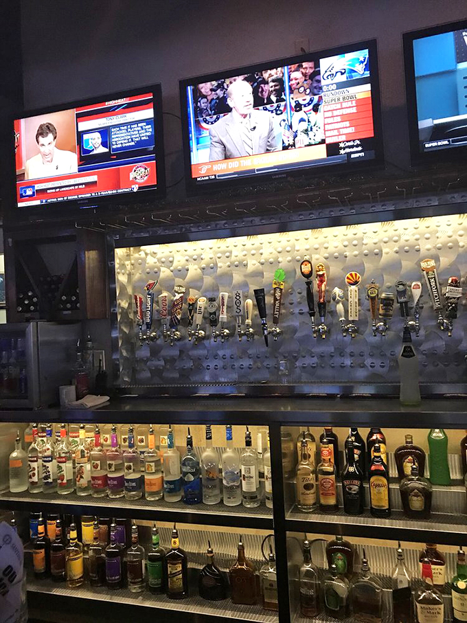 A bar setup that means serious business – where beer taps stand at attention like soldiers ready to serve the thirsty masses.
