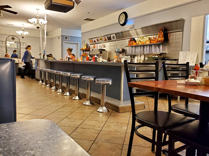 The counter seating &ndash; where breakfast theater unfolds and solo diners can watch short-order poetry in motion while sipping endless coffee.