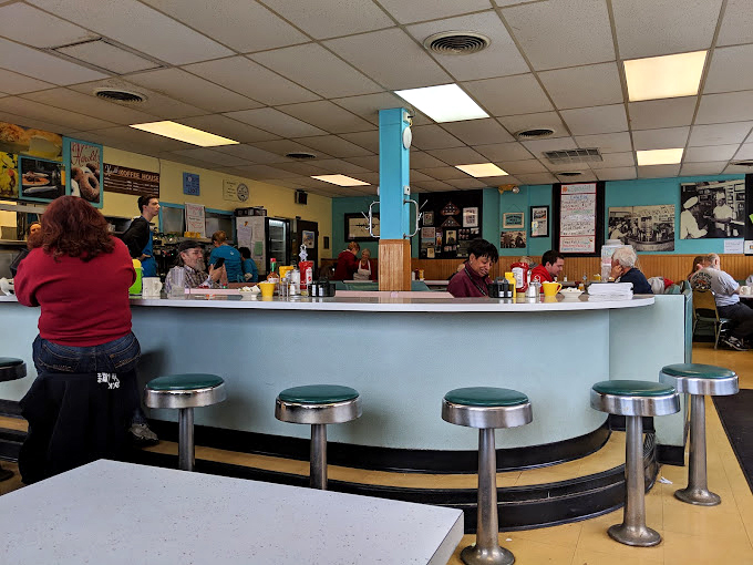 The counter seats &ndash; where regulars have been solving the world's problems over coffee since Eisenhower was in office.