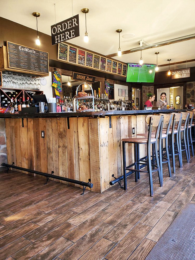 The bar beckons with the promise of perfectly poured pints and bartenders who know the difference between a good drink and a great one.