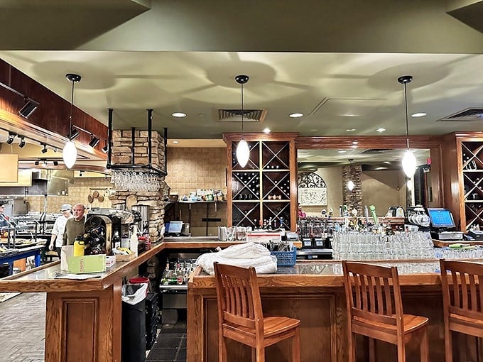 The bar area stands ready to provide liquid courage for your third trip to the pasta station.