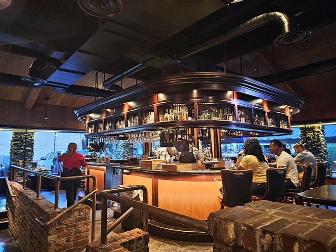 The bar at Cherokee Grill—where mountain lodge meets mixology, and strangers become friends over perfectly poured old fashioneds.