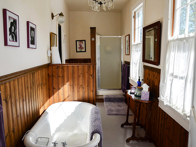 A bathroom that whispers "Victorian elegance" while still offering modern comforts&mdash;that clawfoot tub has stories to tell.