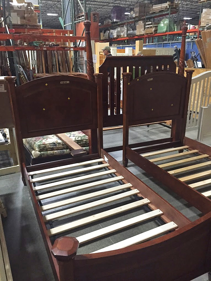 Twin bed frames standing at attention, ready to serve in guest rooms, kids' bedrooms, or wherever sleep needs to happen affordably.