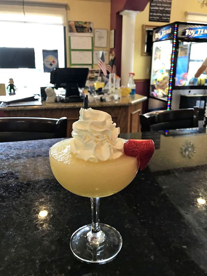 This isn't just a beverage&mdash;it's a vacation in a glass. Topped with whipped cream and a strawberry sentinel, it's liquid happiness with a view.
