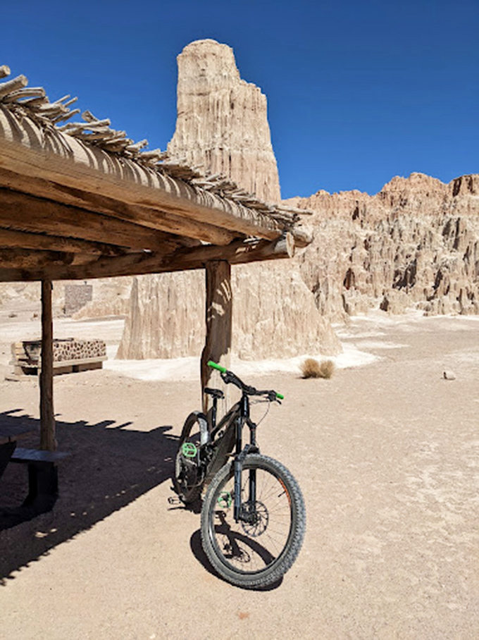 Mountain biking meets geological marvels under rustic shelters. This two-wheeled adventure spot offers views that make every pedal stroke worthwhile.