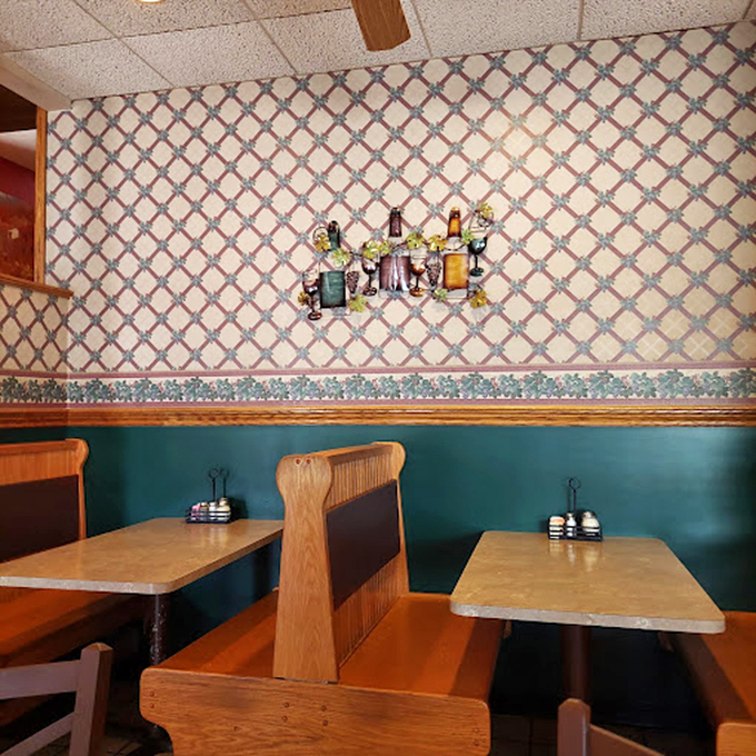 Wooden booths polished by generations of elbows and conversations. The wall décor isn't trendy—it's timeless, just like the recipes served here.
