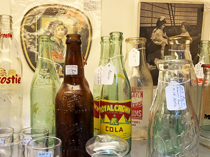 Vintage bottles whisper tales of soda fountains and corner drugstores. That Royal Crown Cola bottle probably witnessed first dates and after-school hangouts in a simpler America.