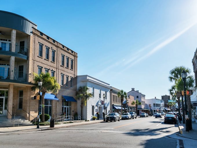 Historic buildings stand shoulder to shoulder along Bay Street, their facades telling stories of centuries past while housing modern delights.