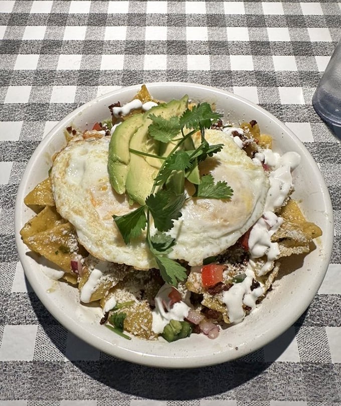 Chilaquiles that would make your abuela proud, topped with a perfect sunny-side egg and avocado. Breakfast with a kick that wakes up more than just your taste buds.