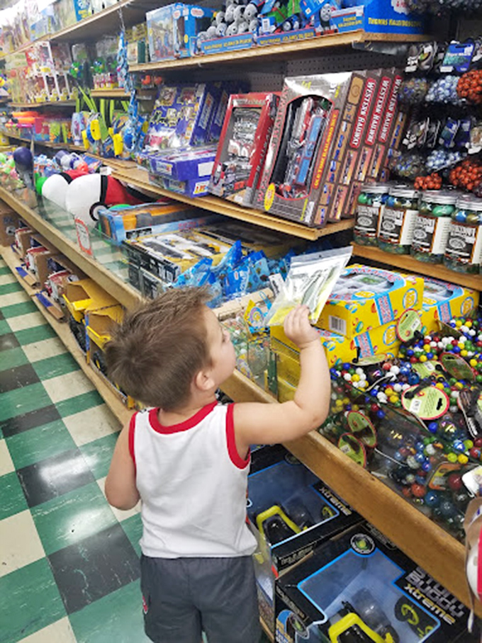 Childhood wonder captured in a single glance. This little explorer demonstrates the proper way to experience Dick's 5 & 10&mdash;with unbridled curiosity. 