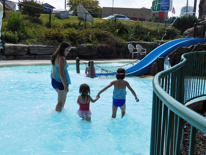 The shallow entry area &ndash; where future Olympic swimmers take their first confident steps while parents capture enough photos to fill sixteen digital albums.