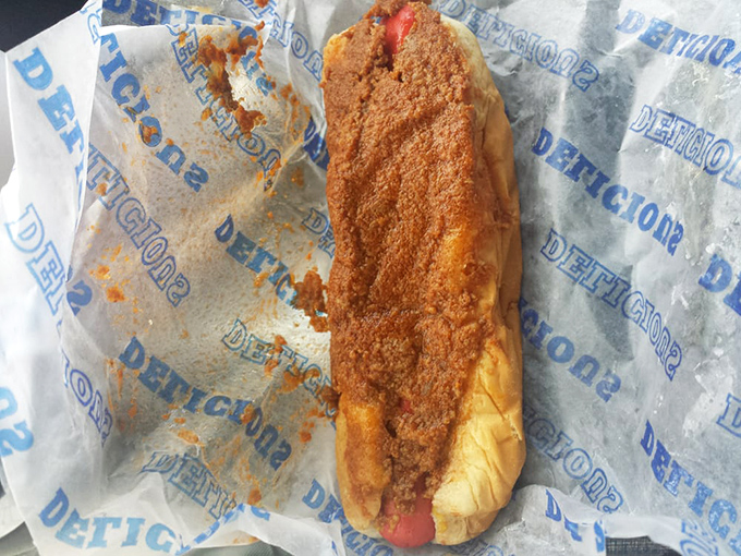 The legendary chili dog in all its messy glory &ndash; where napkins are essential but restraint is impossible.
