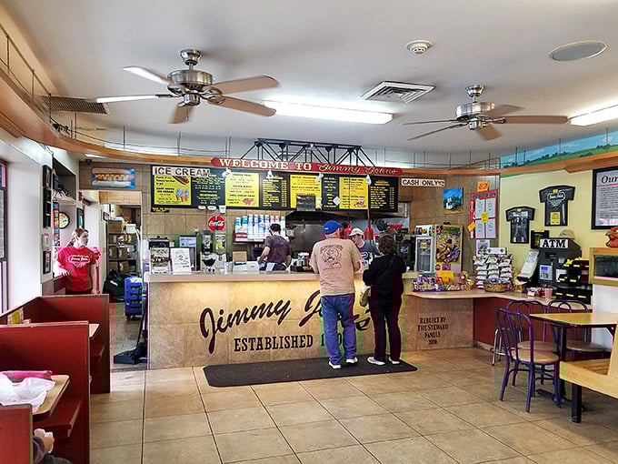 The counter where hot dog dreams come true. Behind that glass case lies decades of culinary tradition and the promise of satisfaction.