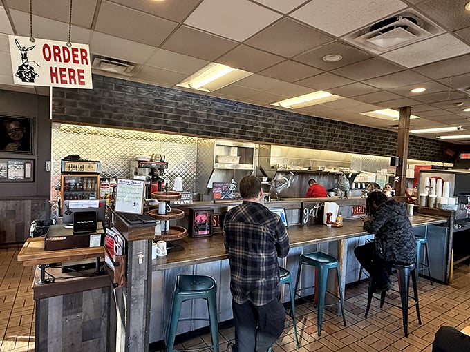 The counter seating offers front-row tickets to the breakfast show. Notice no one's staring at their phones&mdash;that's what good food does to people.