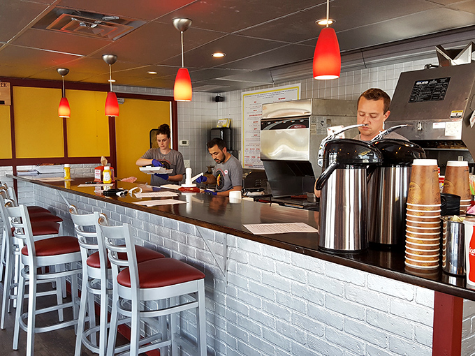 This counter area reveals the beating heart of Woody's&mdash;a kitchen team focused on turning fresh ingredients into memorable meals.