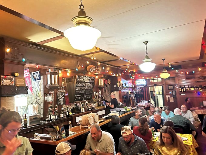 Diners lean in, completely engrossed in their meals. The outside world ceases to exist when you're face-to-face with food this good.