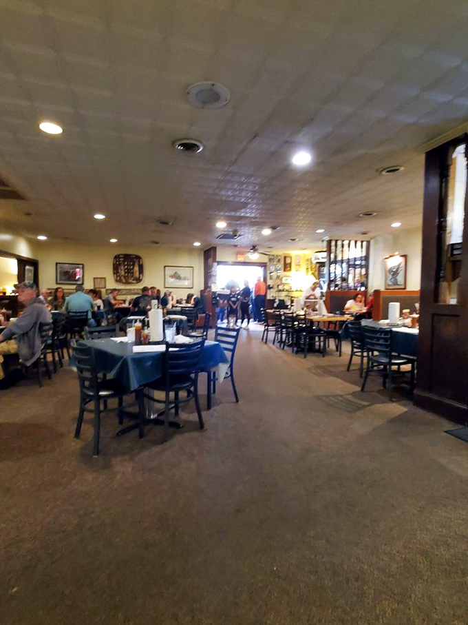 The dining room hums with the satisfied murmurs of patrons experiencing what might be Kentucky's most authentic food tradition.